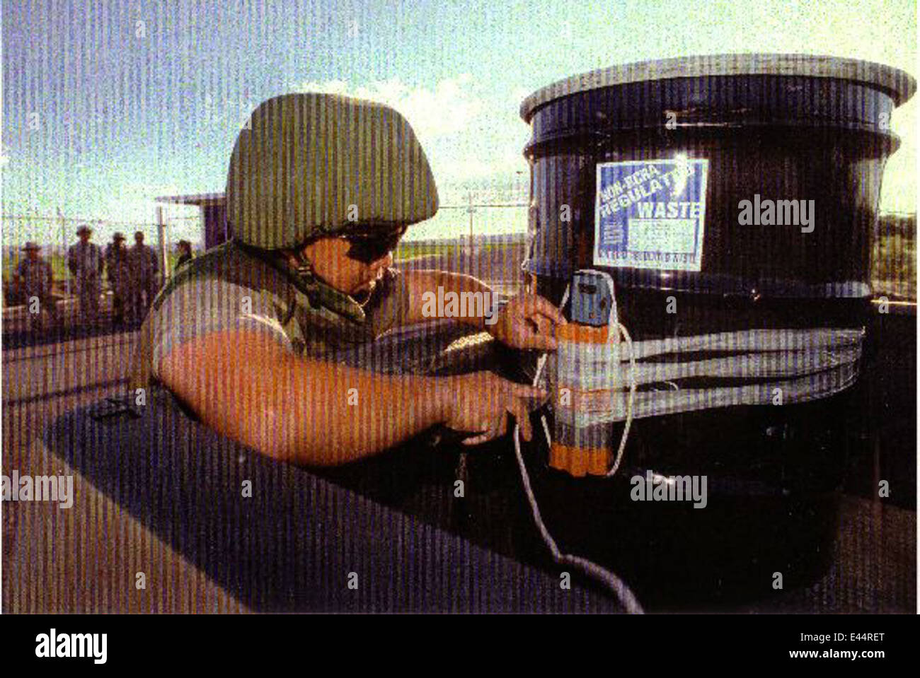 A photograph showing a member of the Explosive Ordnance Disposal (EOD ...