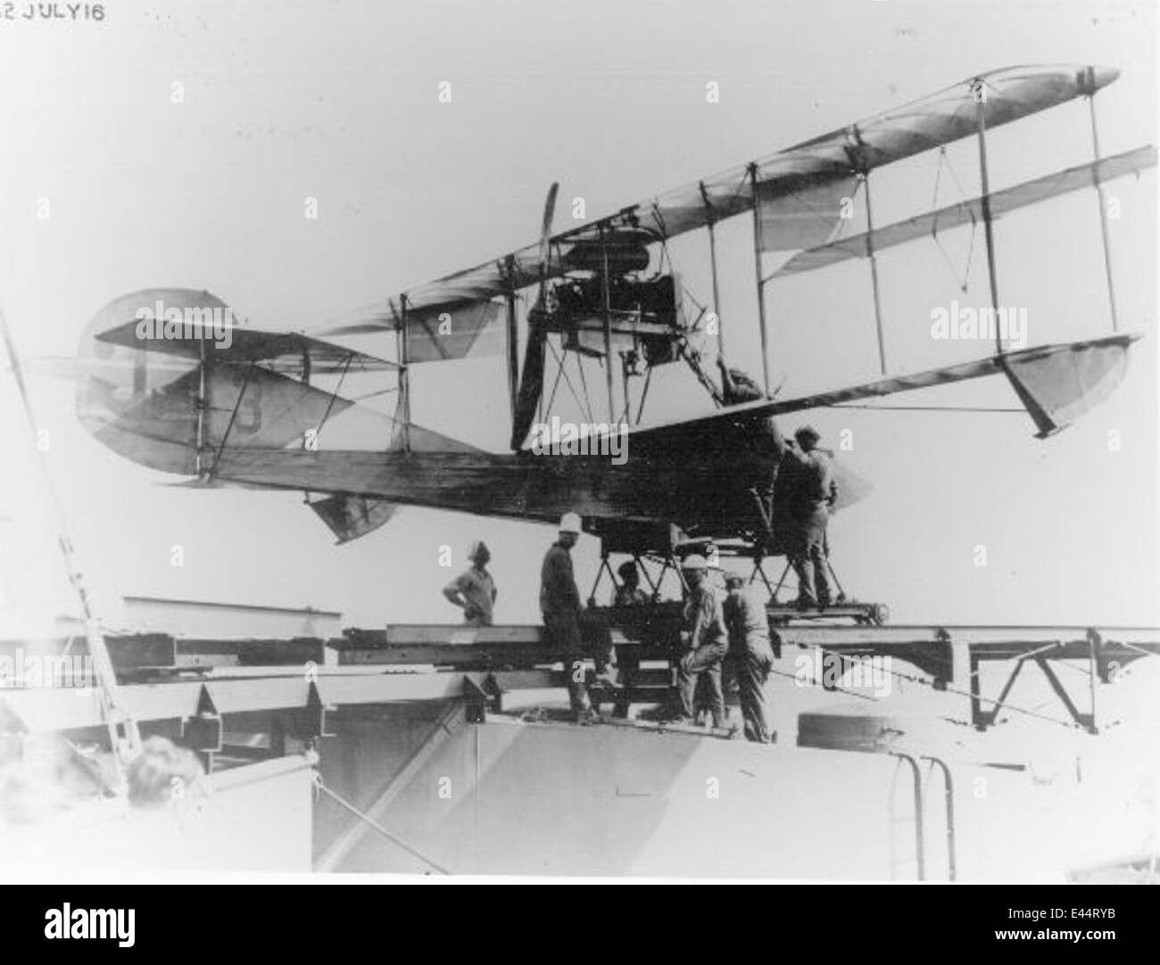 A photograph of the Curtiss C3 AB3 aircraft on a catapult, captured in ...