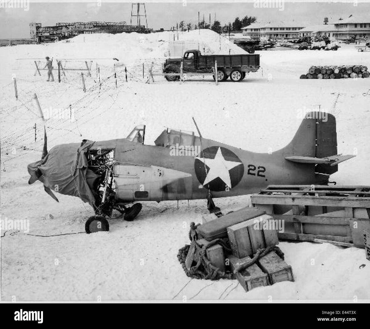 This photograph shows a damaged F4F Wildcat aircraft from the USS ...