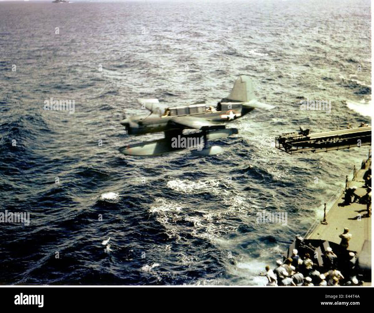 Photograph of a Curtiss SO3C aircraft being catapulted from a carrier ...