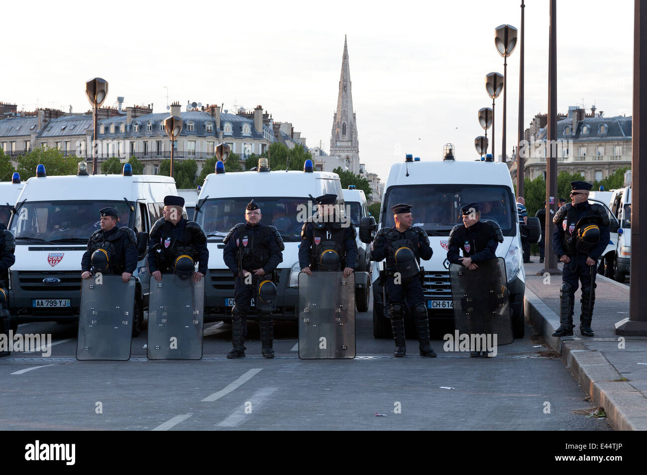 French riot police standing on bridge in Paris Stock Photo - Alamy