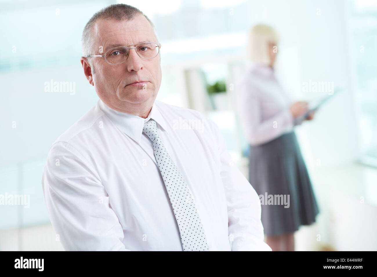 Serious female boss hi-res stock photography and images - Alamy