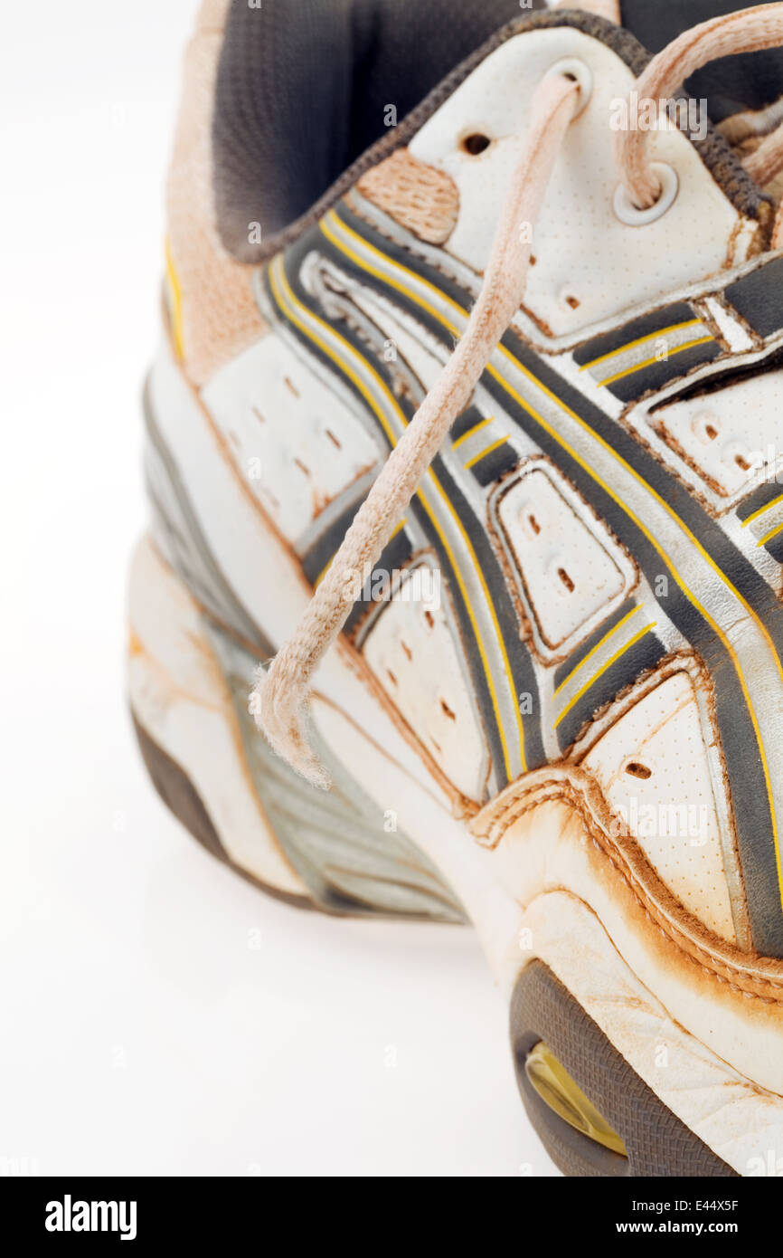 Old tennis shoes of a clay court. Used athletic shoes Stock Photo - Alamy