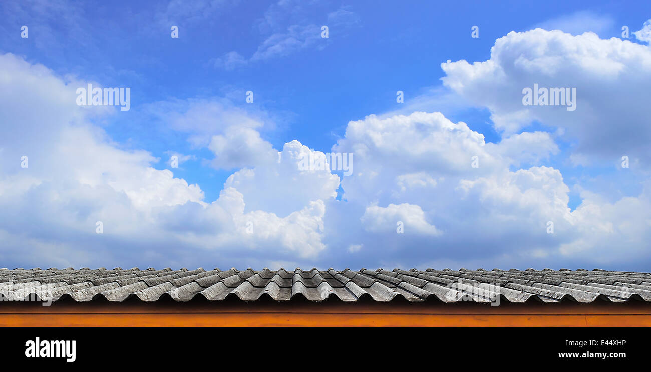The Roof-Tile and Cloudy Blue Sky Stock Photo - Alamy