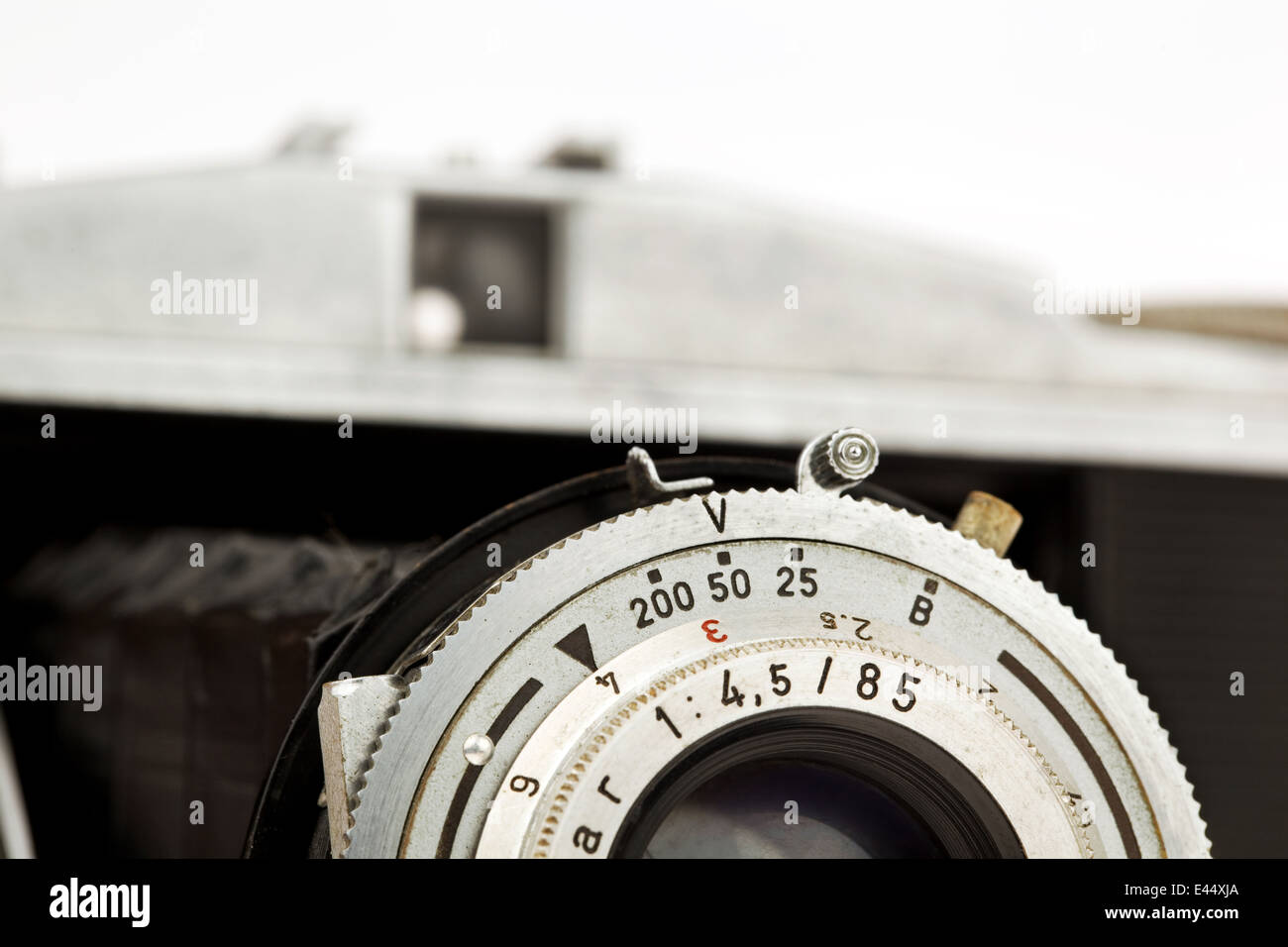 An old camera from the 50s on a white background Stock Photo - Alamy