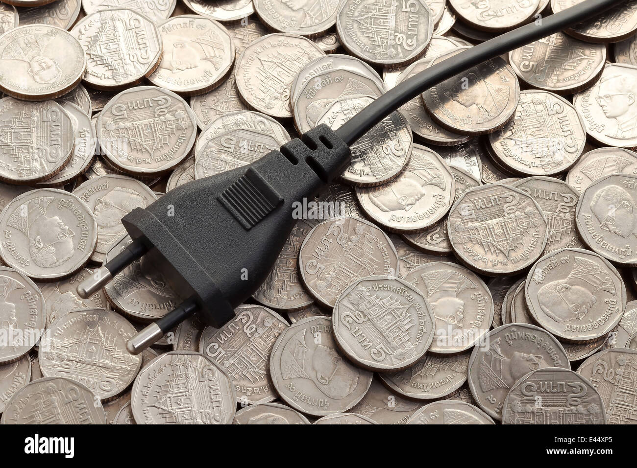 Power plug on money Stock Photo - Alamy