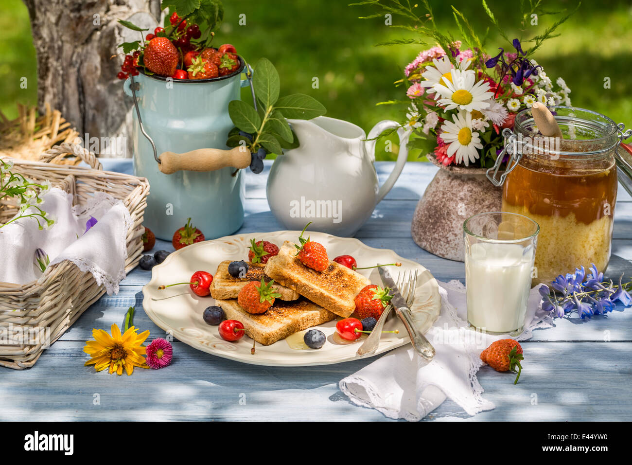 Summer breakfast in the garden Stock Photo - Alamy