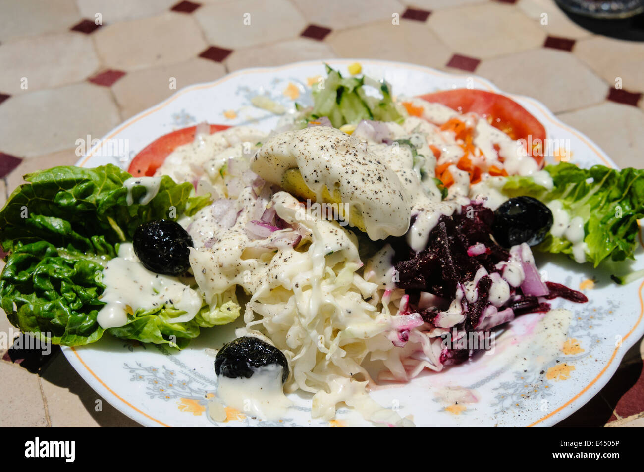 Traditional Moroccan salad consisting tomatoes, cabbage, beetroot ...