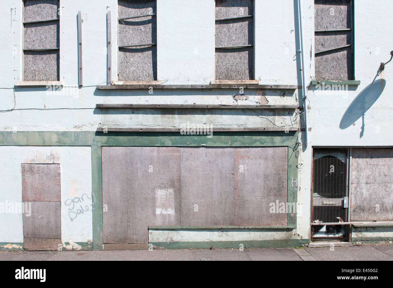 Village shops boarded up hi-res stock photography and images - Alamy