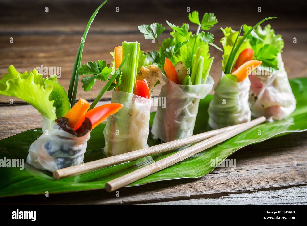 Fresh spring rolls wrapped in rice paper Stock Photo - Alamy