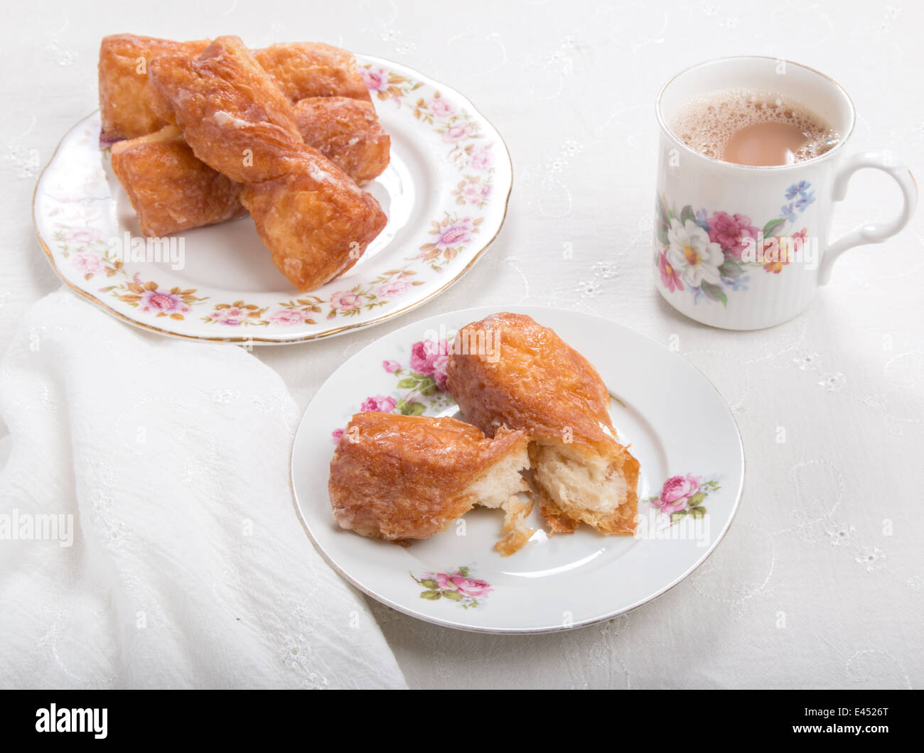 Yum yum's/iced sticky twisted donut fingers for afternoon tea set on ...