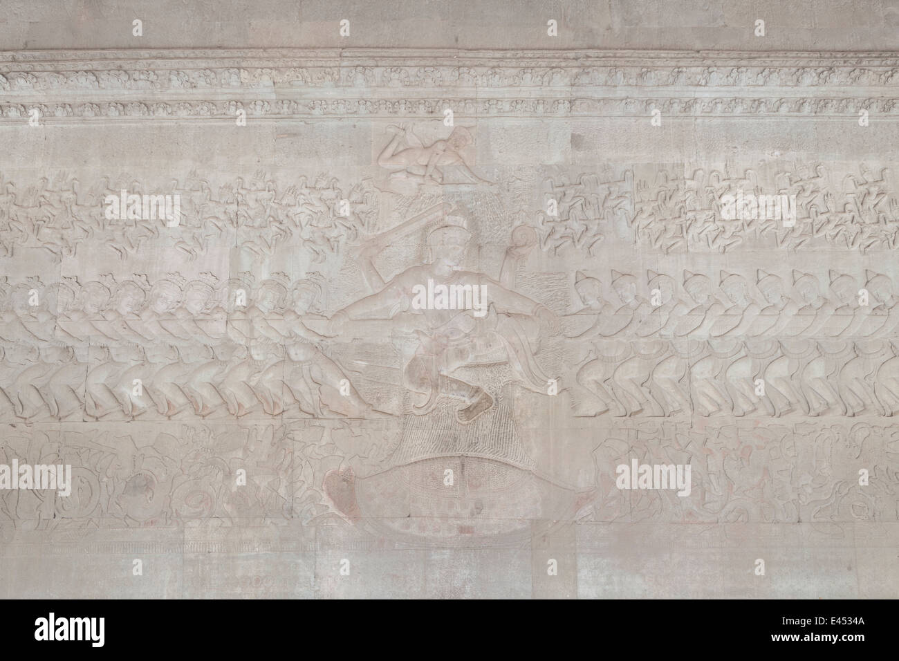 Vishnu in the centre of the bas relief depicting the churning of the ...