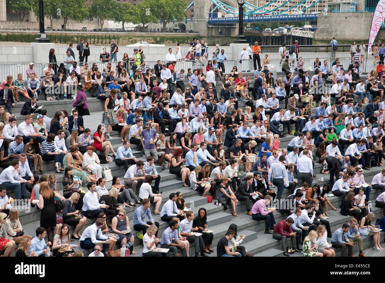 London, UK. 2nd July, 2014. A large crowd sit and watch tennis at ...