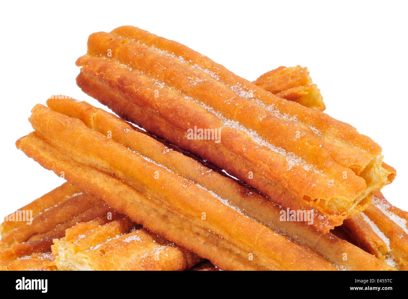 a pile of churros typical of Spain on a white background Stock Photo ...