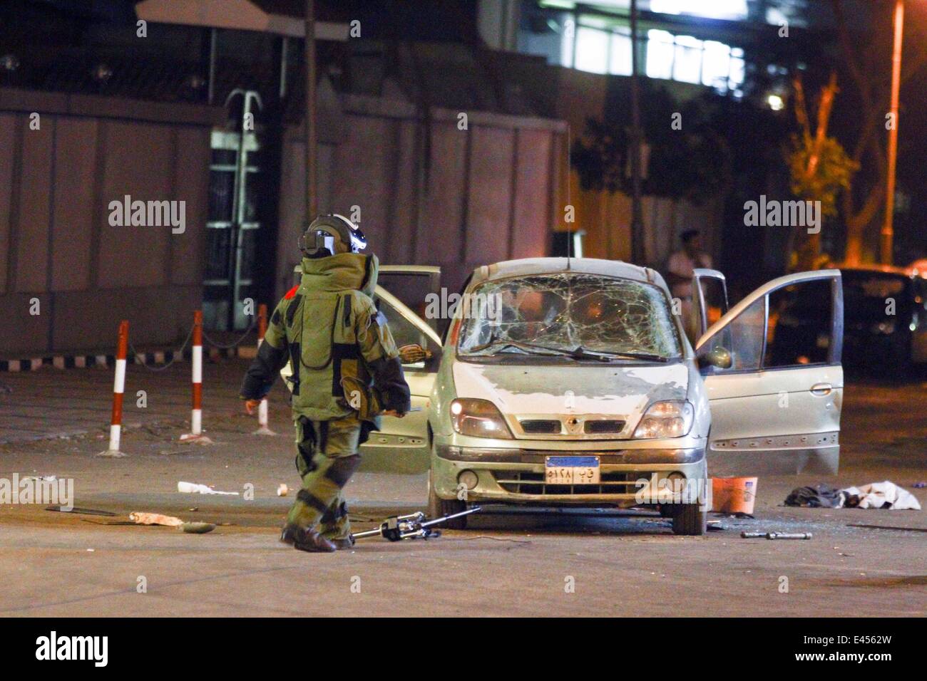 Cairo, Egypt. 3rd July, 2014. An explosive investigator checks the bomb ...