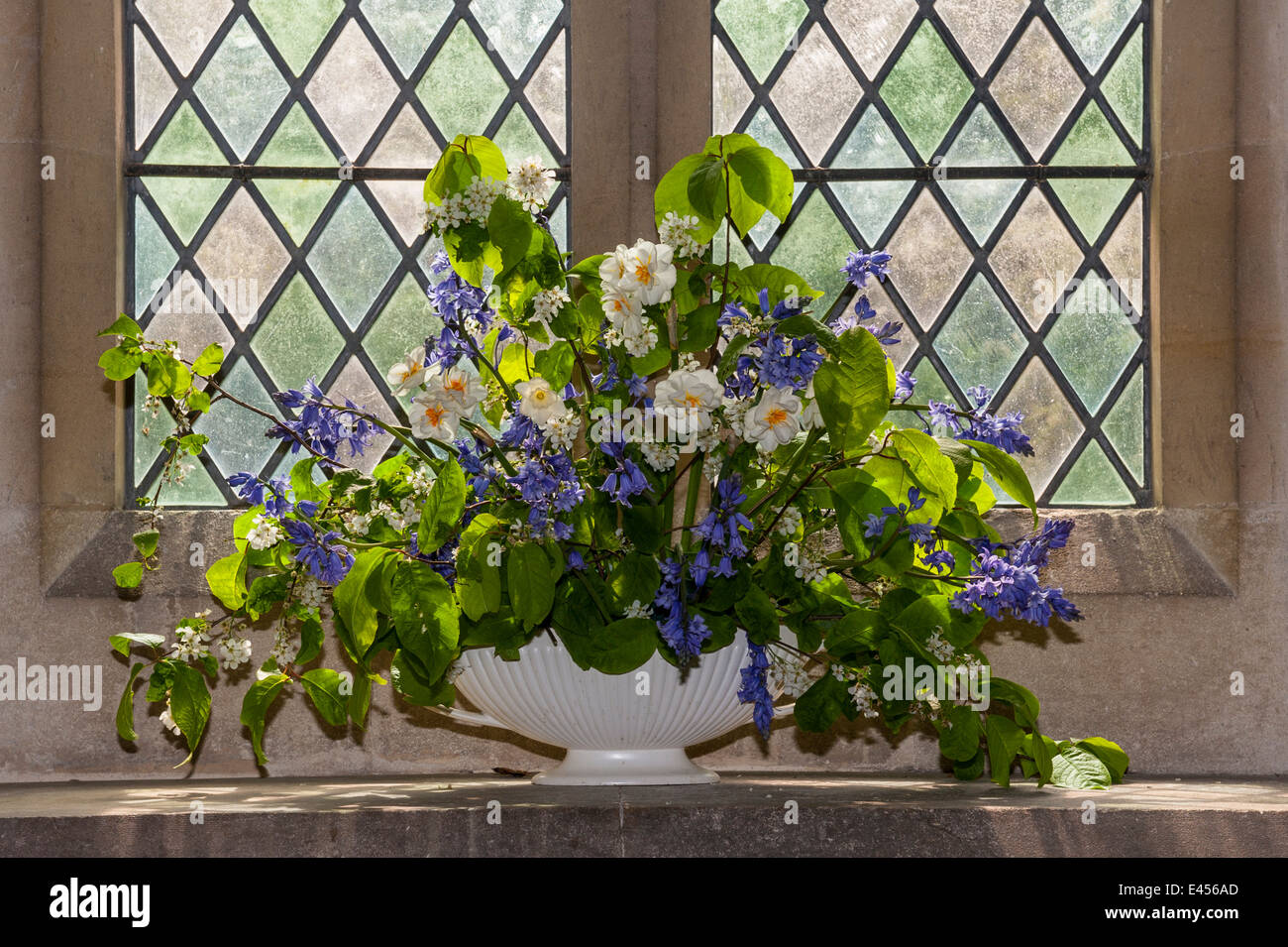 A flower display for Easter inside a UK church Stock Photo - Alamy