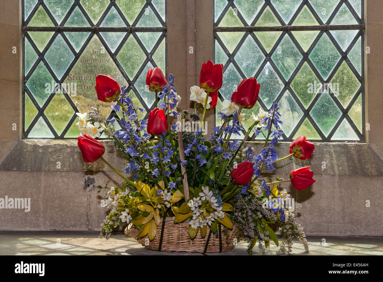 A flower display for Easter inside a UK church Stock Photo - Alamy