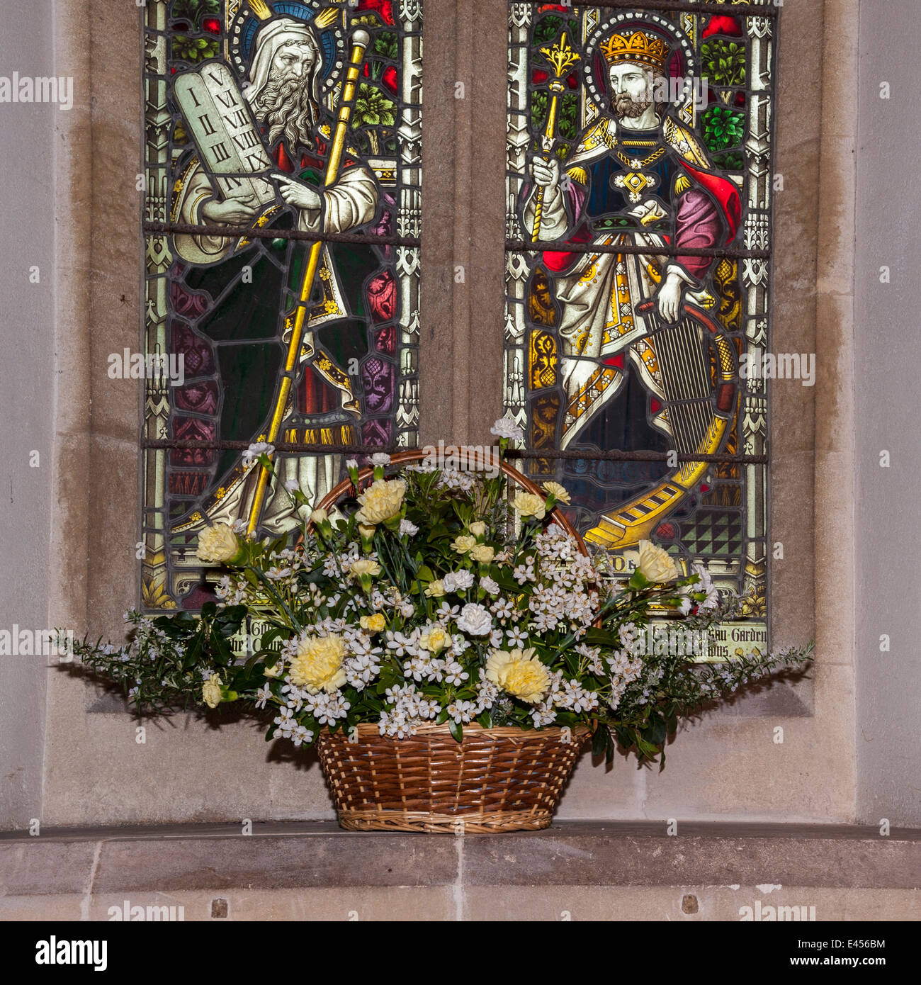 A flower display for Easter inside a UK church Stock Photo - Alamy
