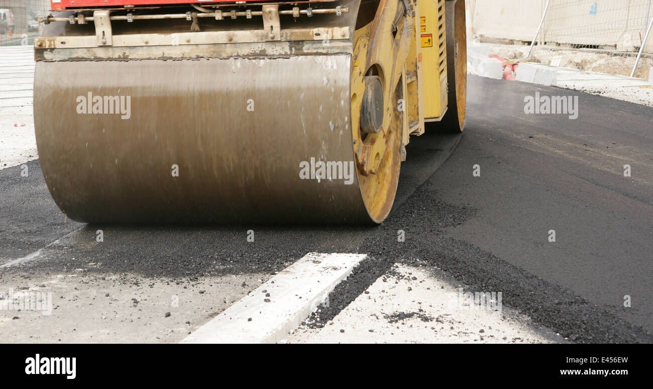 Road roller on asphalt pavement works. Barcelona. Spain Stock Photo - Alamy