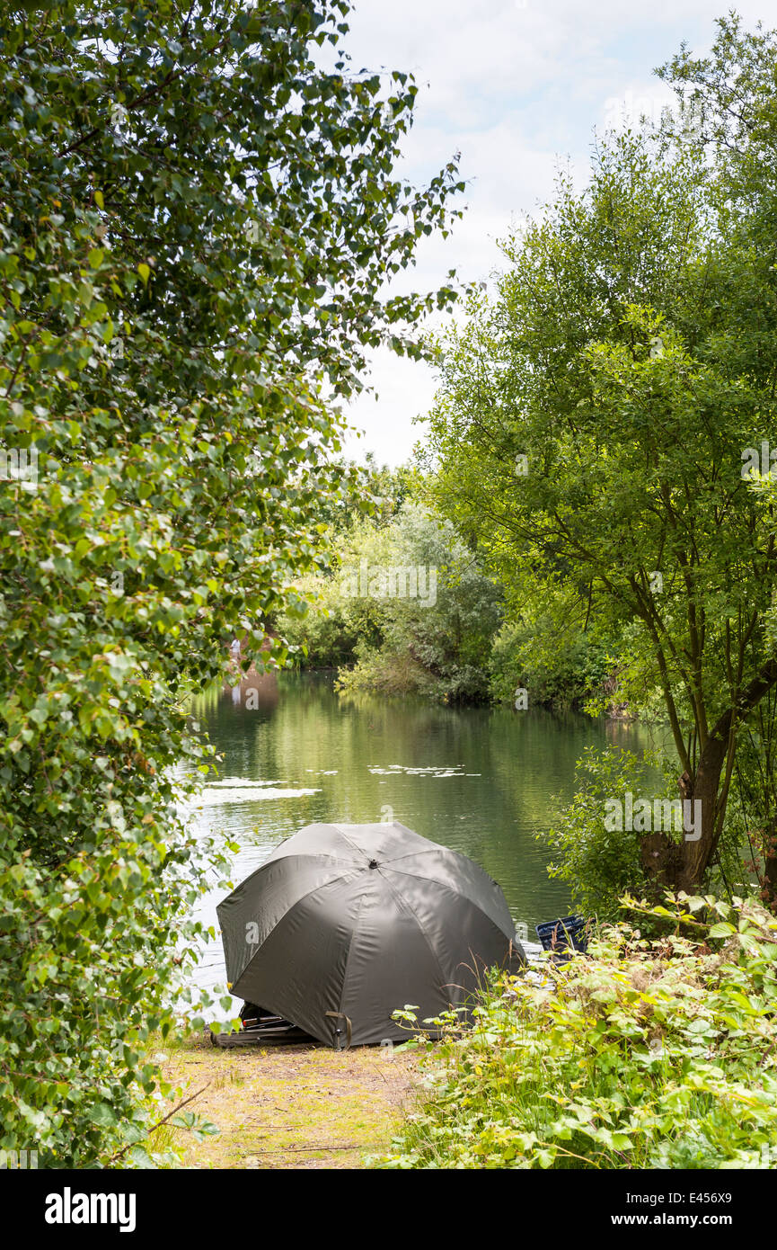 A fisherman fishing at Broome pits near Bungay, Suffolk, England, Great ...