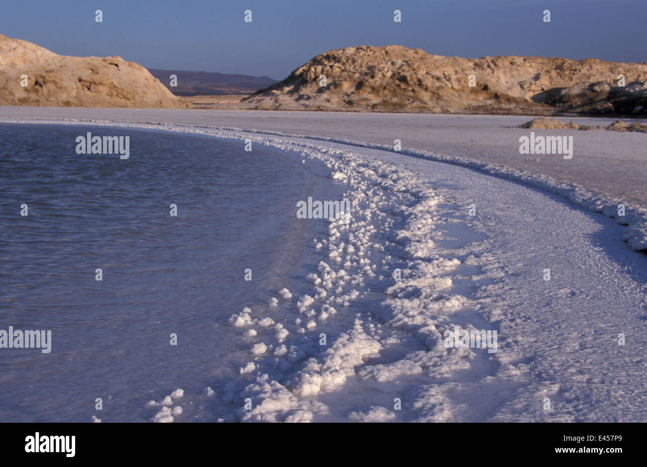 Lac Assal, crystallised salt on shoreline, 150m below sea level ...