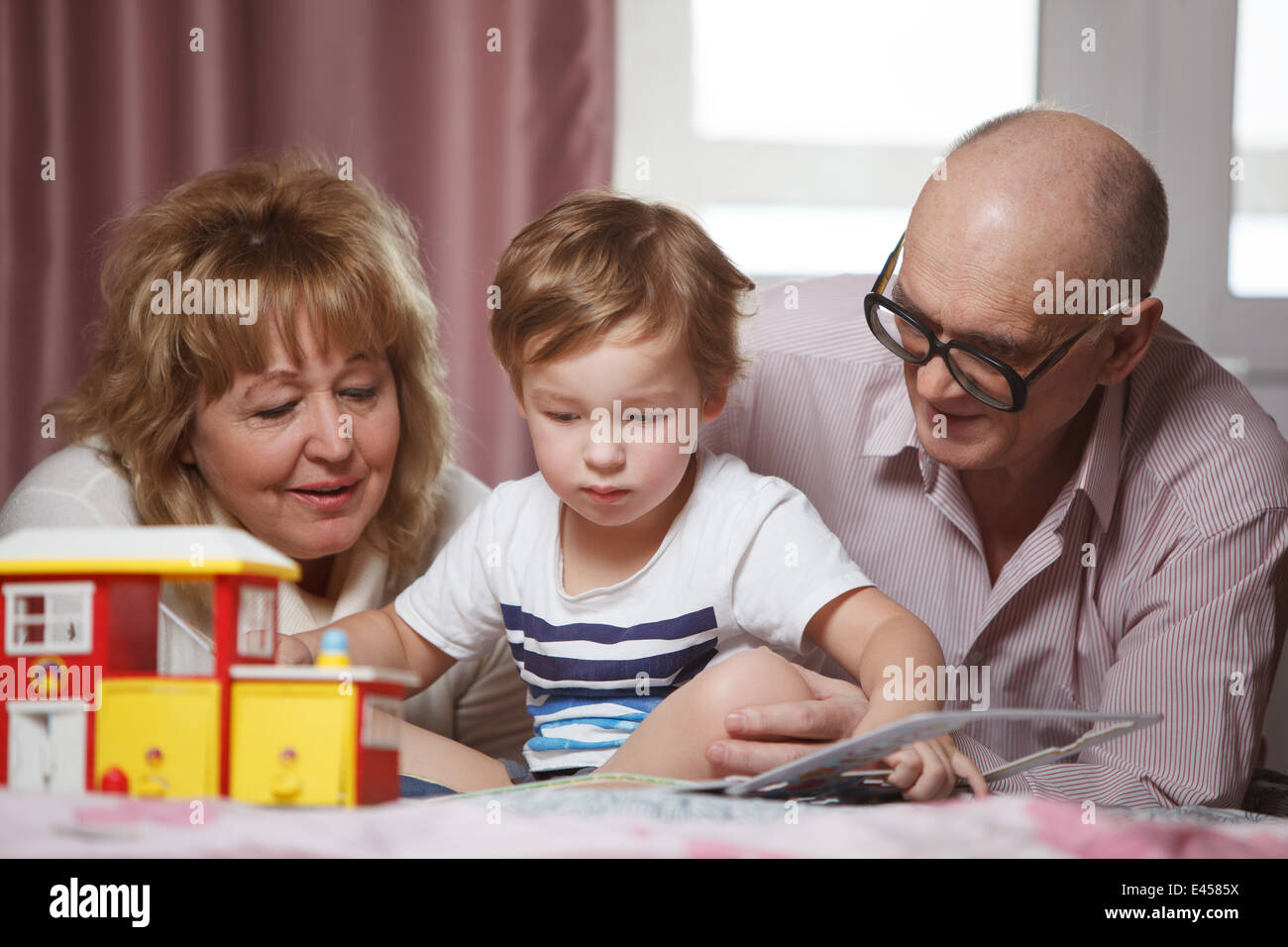 Happy time with grandson Stock Photo - Alamy
