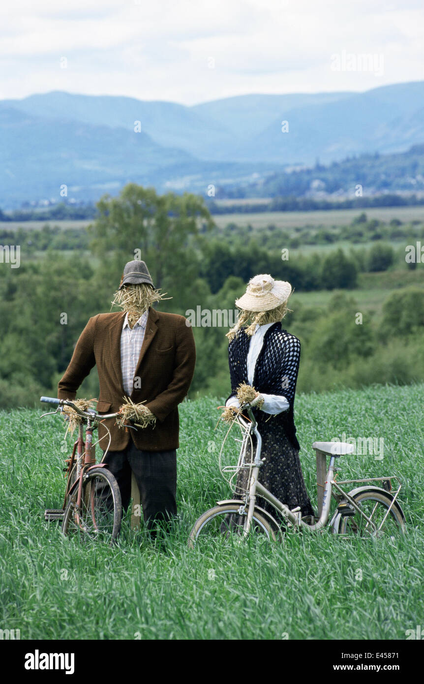 Victorian scarecrows - mock man and woman with bicycles, Strathspey ...