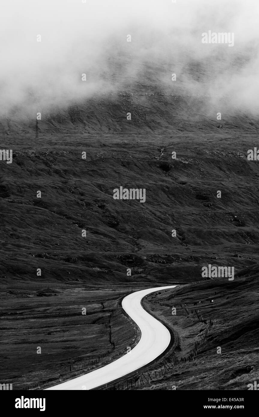 Route 10 winding through basalt landscape, near Skagafjordur, Eysturoy ...