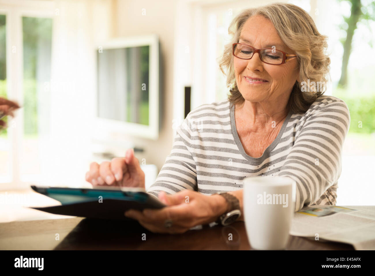 Old woman reading glasses computer hi-res stock photography and images ...