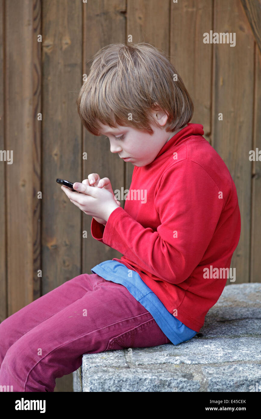 Boy writing message hi-res stock photography and images - Alamy