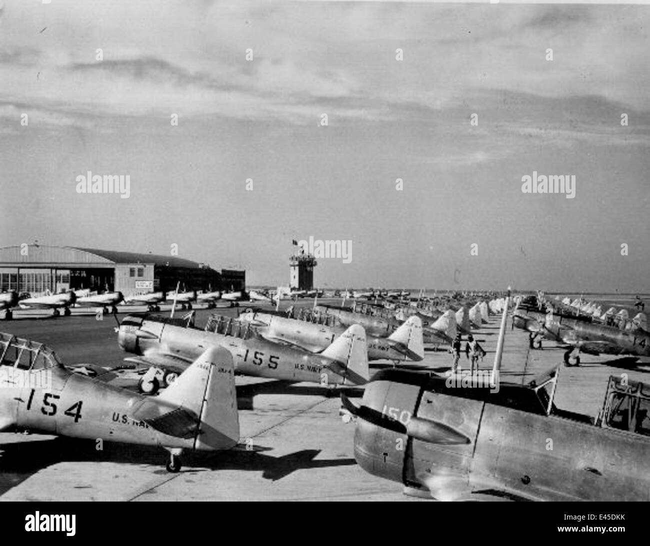 A photograph of the Coprus ramp, featuring a SNJ 7 42, an aircraft used ...
