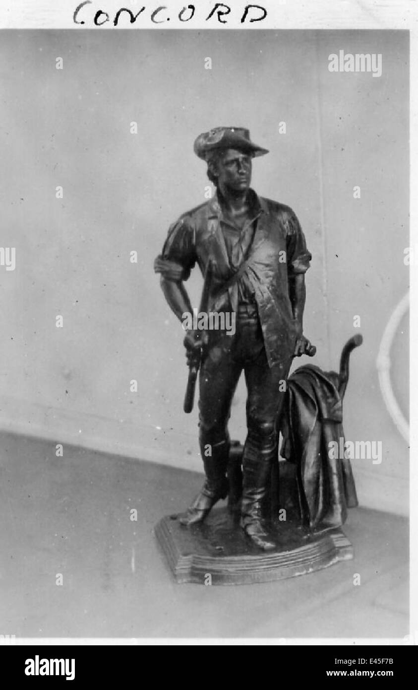 The photograph shows a statue of the USS Concord, a U.S. Navy ship ...