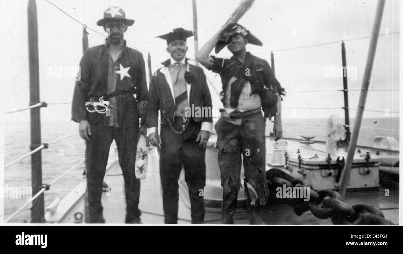 Three Royal Navy personnel, identified as shellbacks, likely undergoing ...