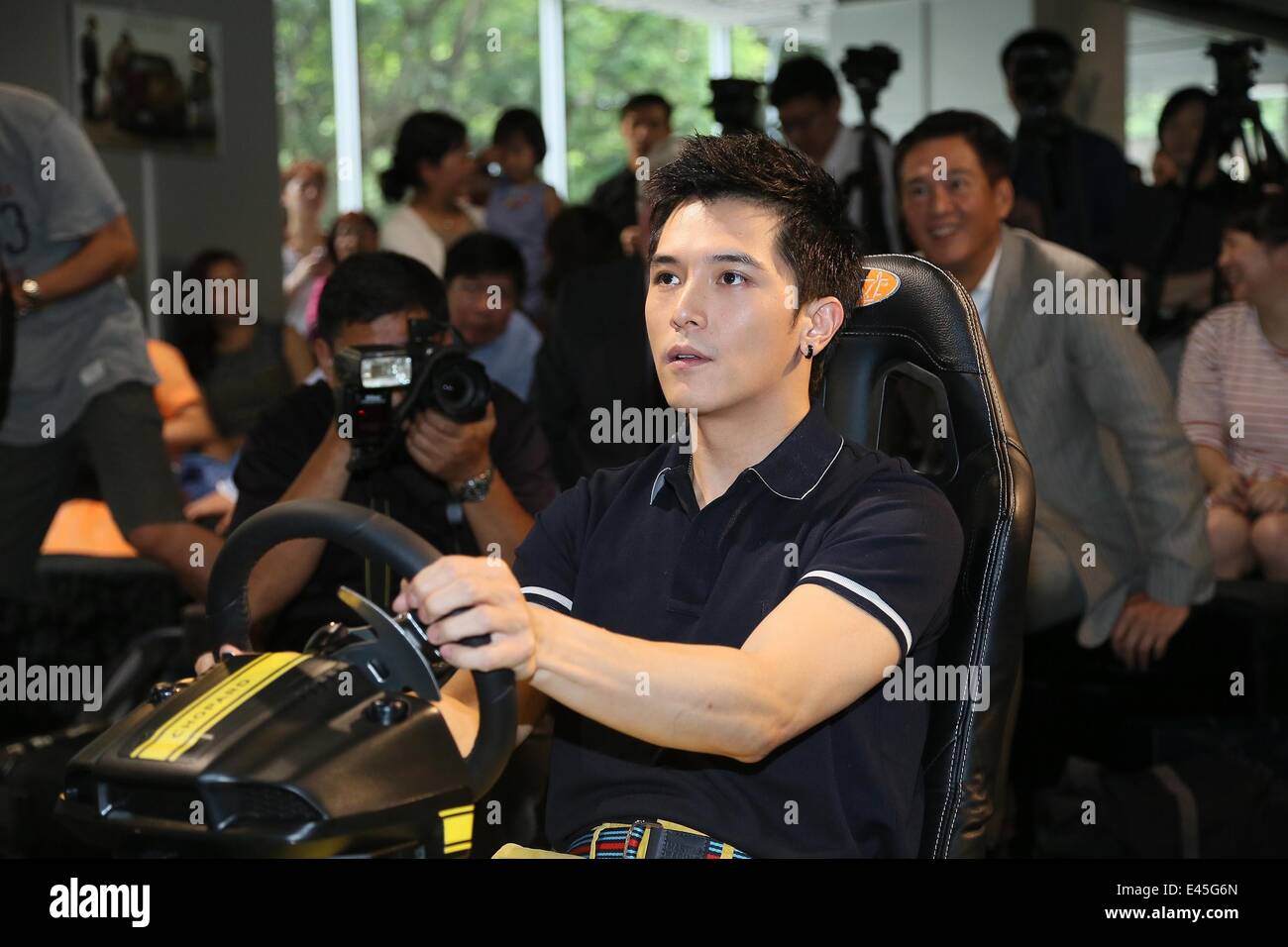 Taipei. 2nd July, 2014. Actor Roy Chiu attends a commercial activity in ...