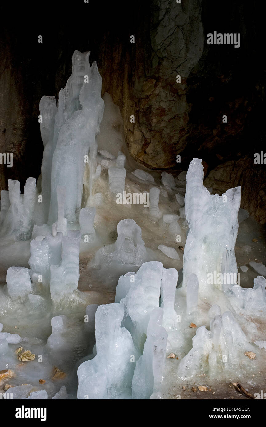 Ice forming stalagmite structures in Ledena Pecina (an ice cave) inside ...