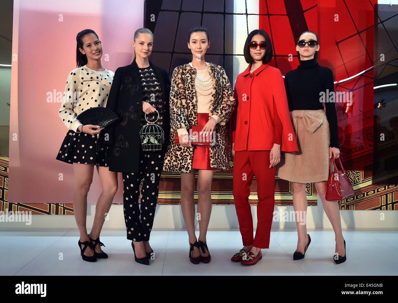 Hong Kong, China. 3rd July, 2014. Models show creations at the preview ...