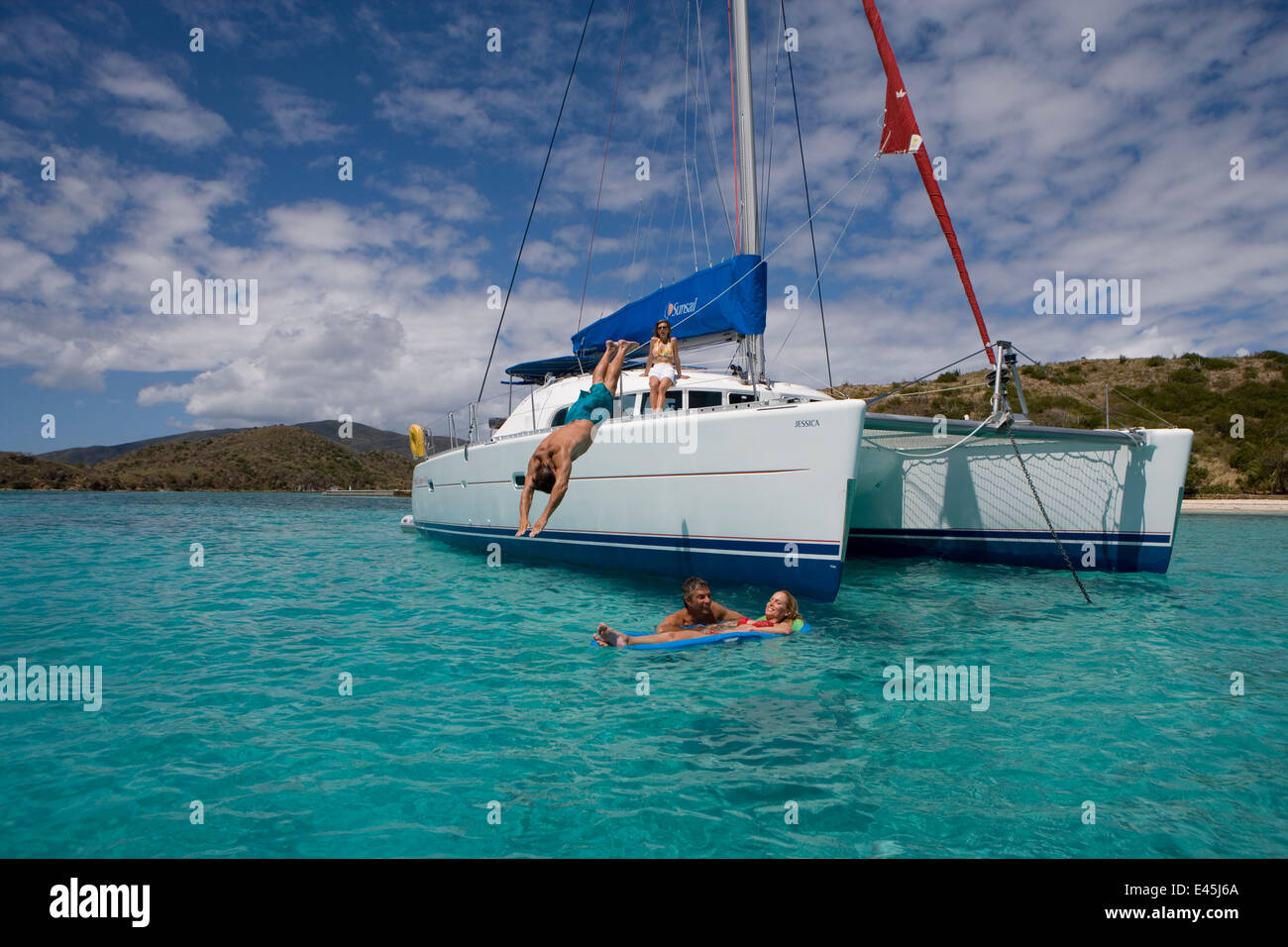 Couple diving man jumping hi-res stock photography and images - Alamy