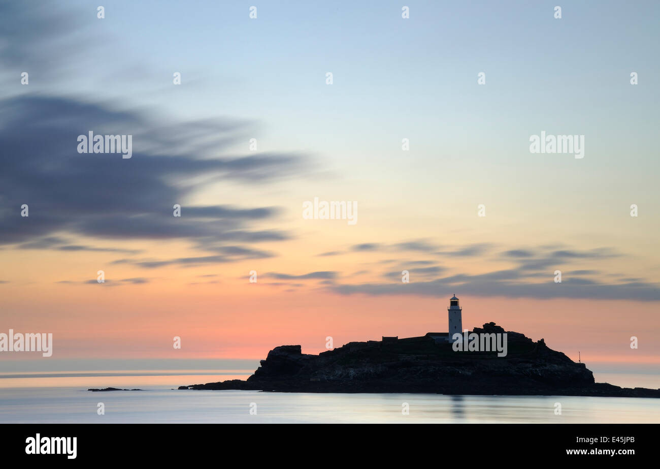 Godrevy Lighthouse at sunset, nr Hayle, Cornwall, UK. June 2009 Stock ...