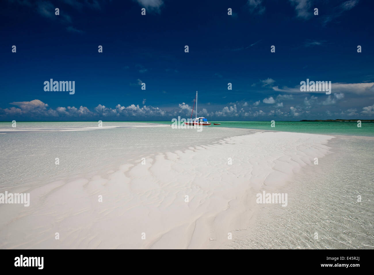 30ft Tiki catamaran "Abaco" pulled up near sand bank in the Exumas ...