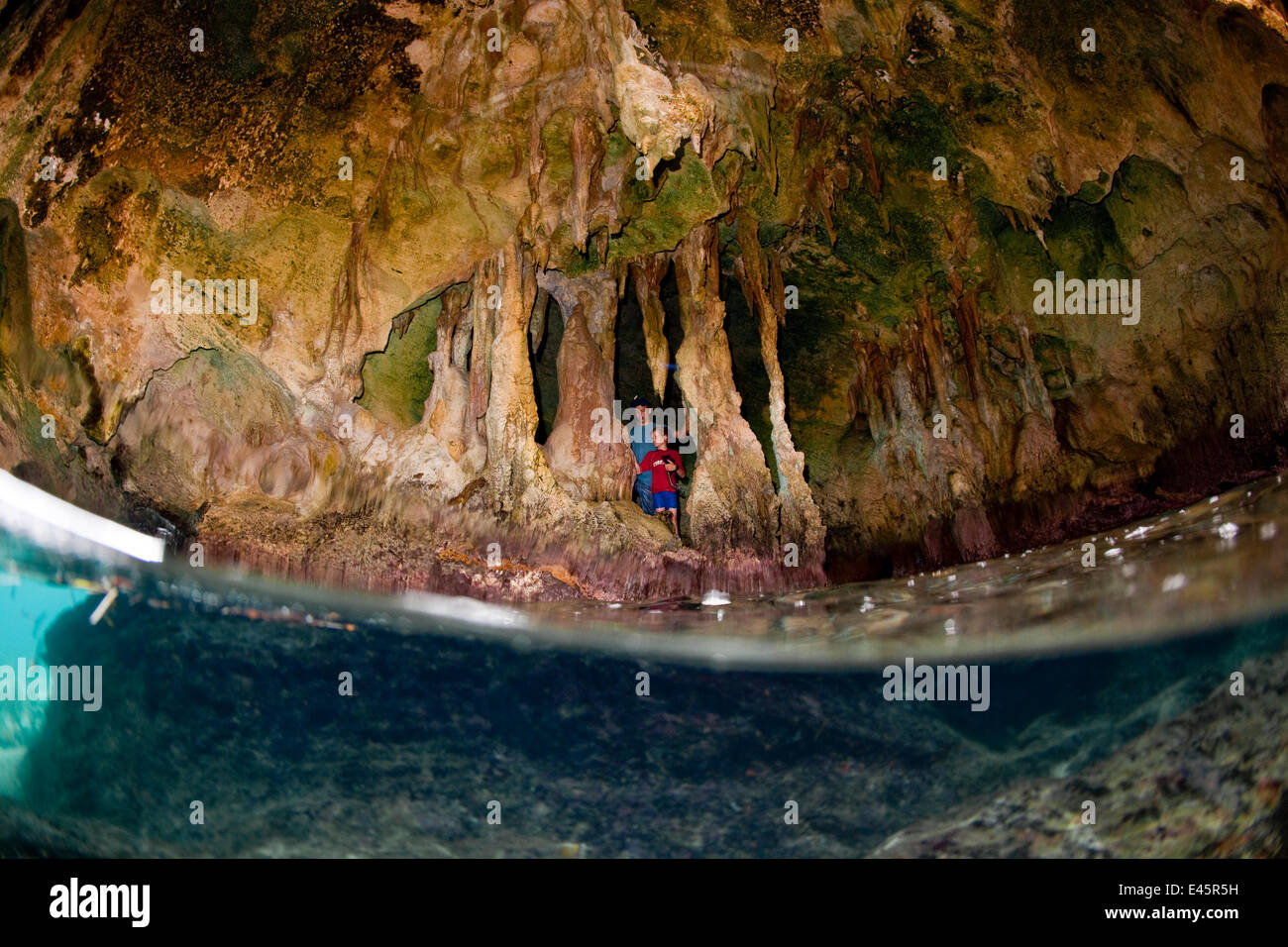 People exploring a cave in the Exumas, Bahamas, Caribbean. June 2009 ...