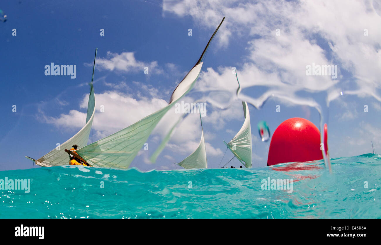 Boats approaching a marker at the Bahamian Sloop regatta, Georgetown ...