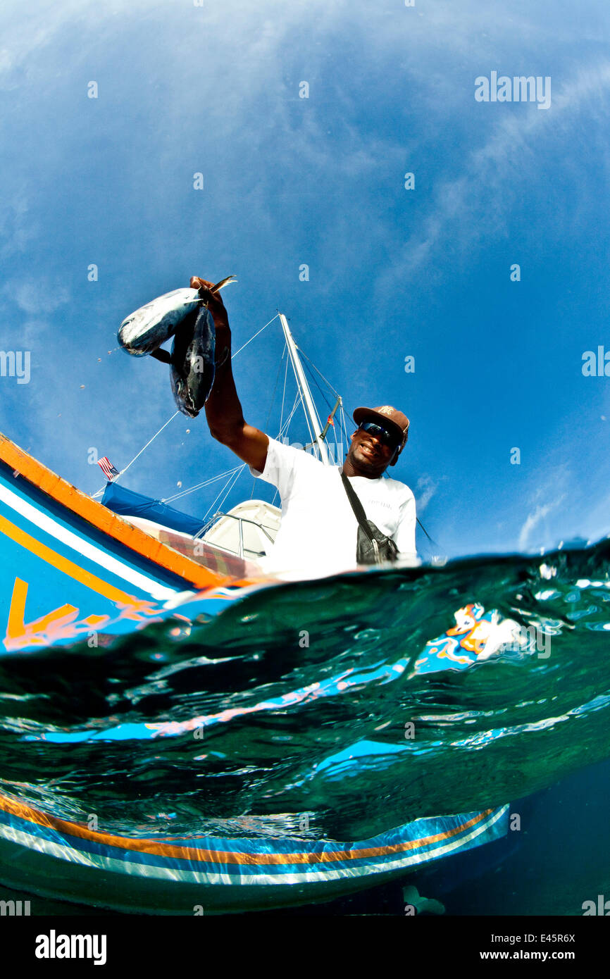 Fish man boat hi-res stock photography and images - Alamy