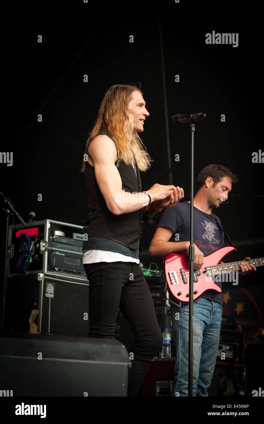 The Fifty four plates on stage at The Bearded Theory festival Stock ...