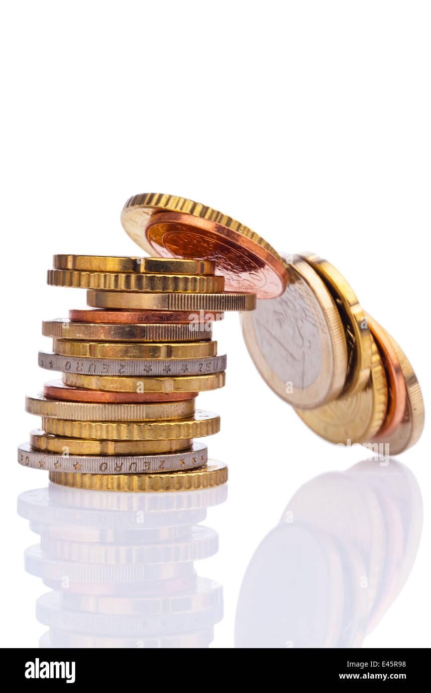 A toppling stack of coins of euro cents. Isolated on white background ...