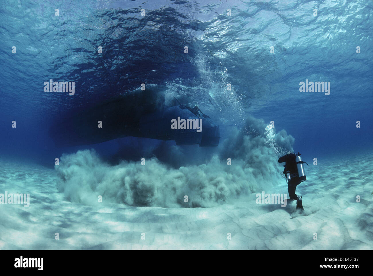 Sandblasters searching and blowing a magnetic hit during the recovery ...