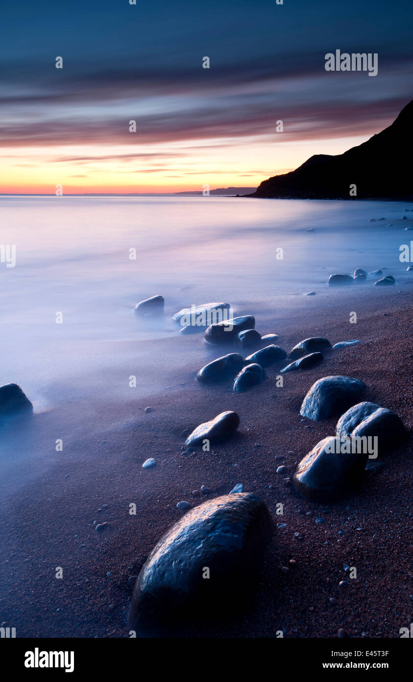Eype beach at sunset and Dorset coastline, nr Bridport, Dorset, England ...