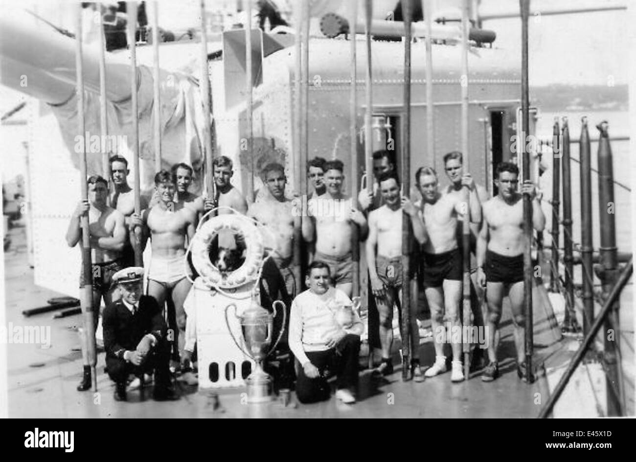 A photograph of the CL10 winning boat crew holding their championship ...