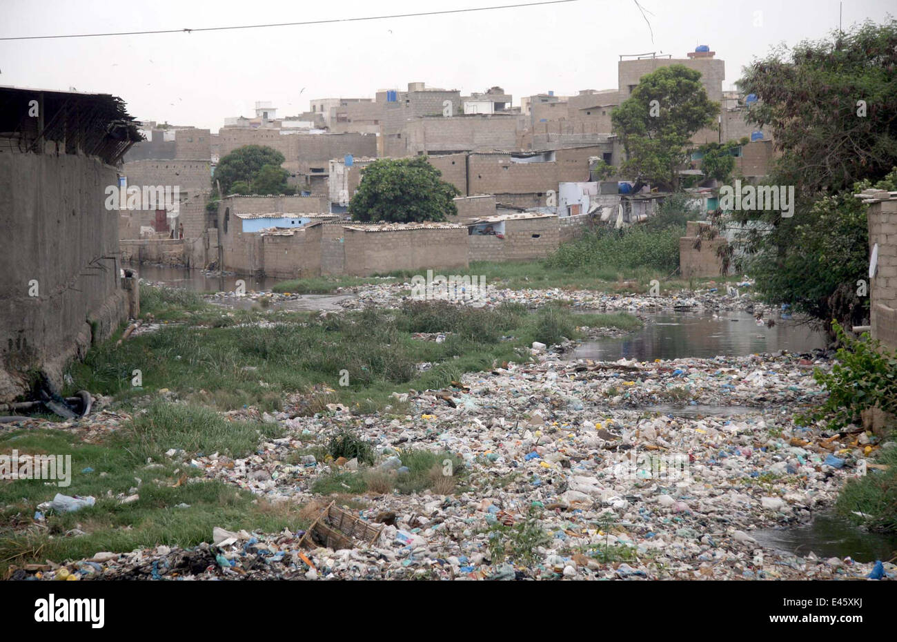 Huge heaps of garbage blocked the flow of drain water may cause of ...
