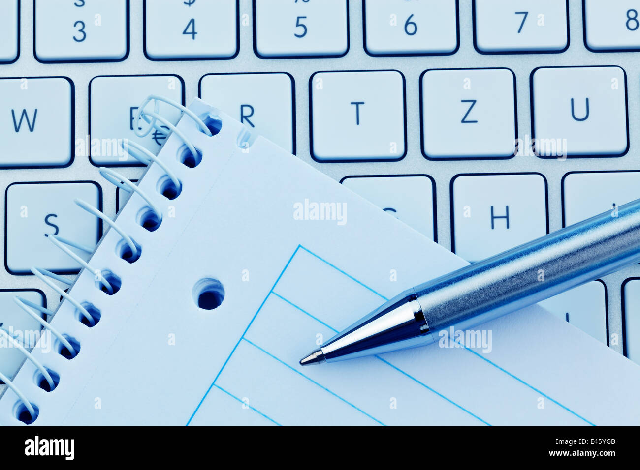 A notepad and keyboard of a computer. Write down and save Stock Photo ...