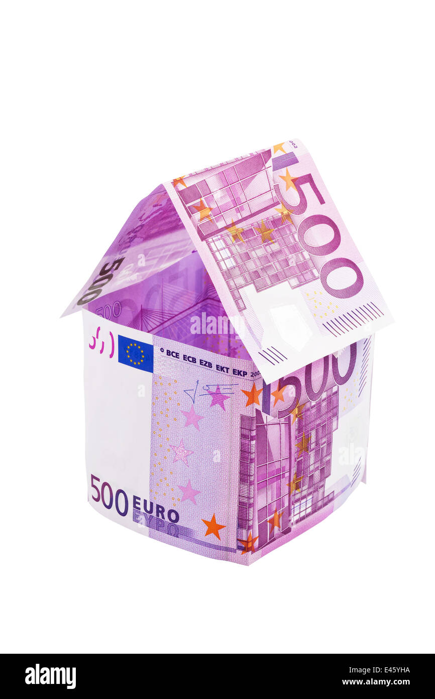 A house built from Euro notes on white background. Building society ...